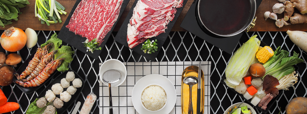 By integrating all the elements like food presentation, music selection ...